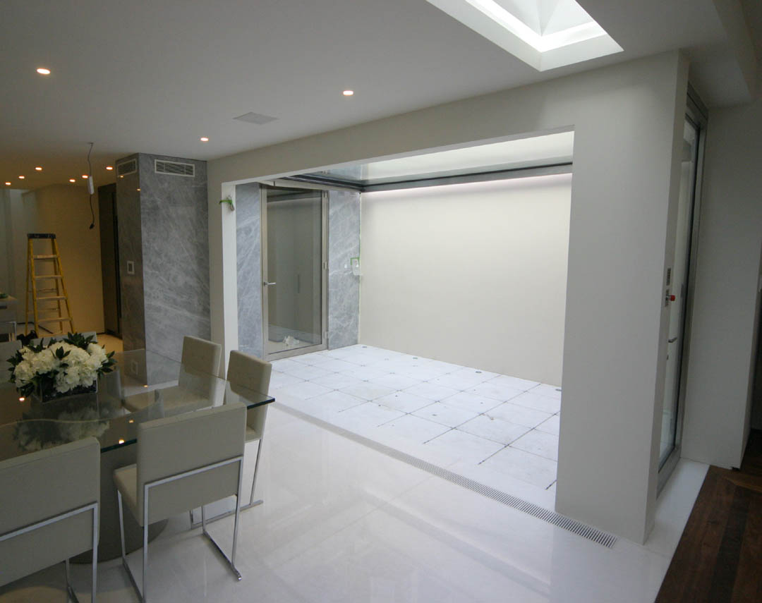 hydraulic hinged opening glass wall | meia – Moving Elements in ...